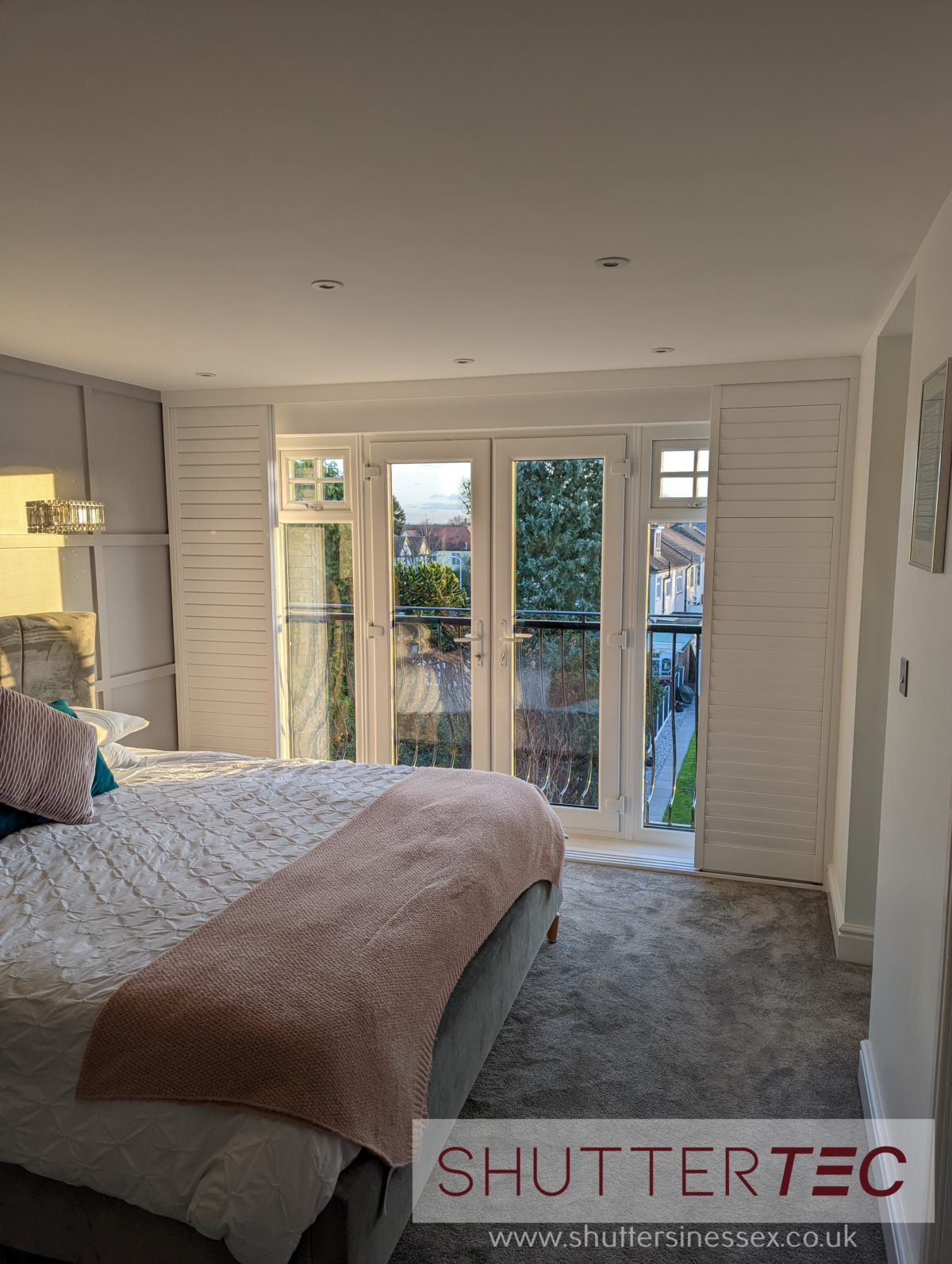 Tracked Shutters - The Solution for Wide Doors | Shuttertec