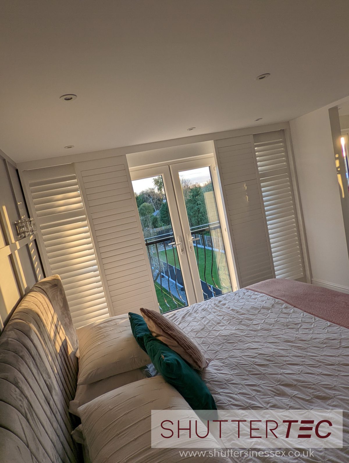 Tracked Shutters - The Solution for Wide Doors | Shuttertec