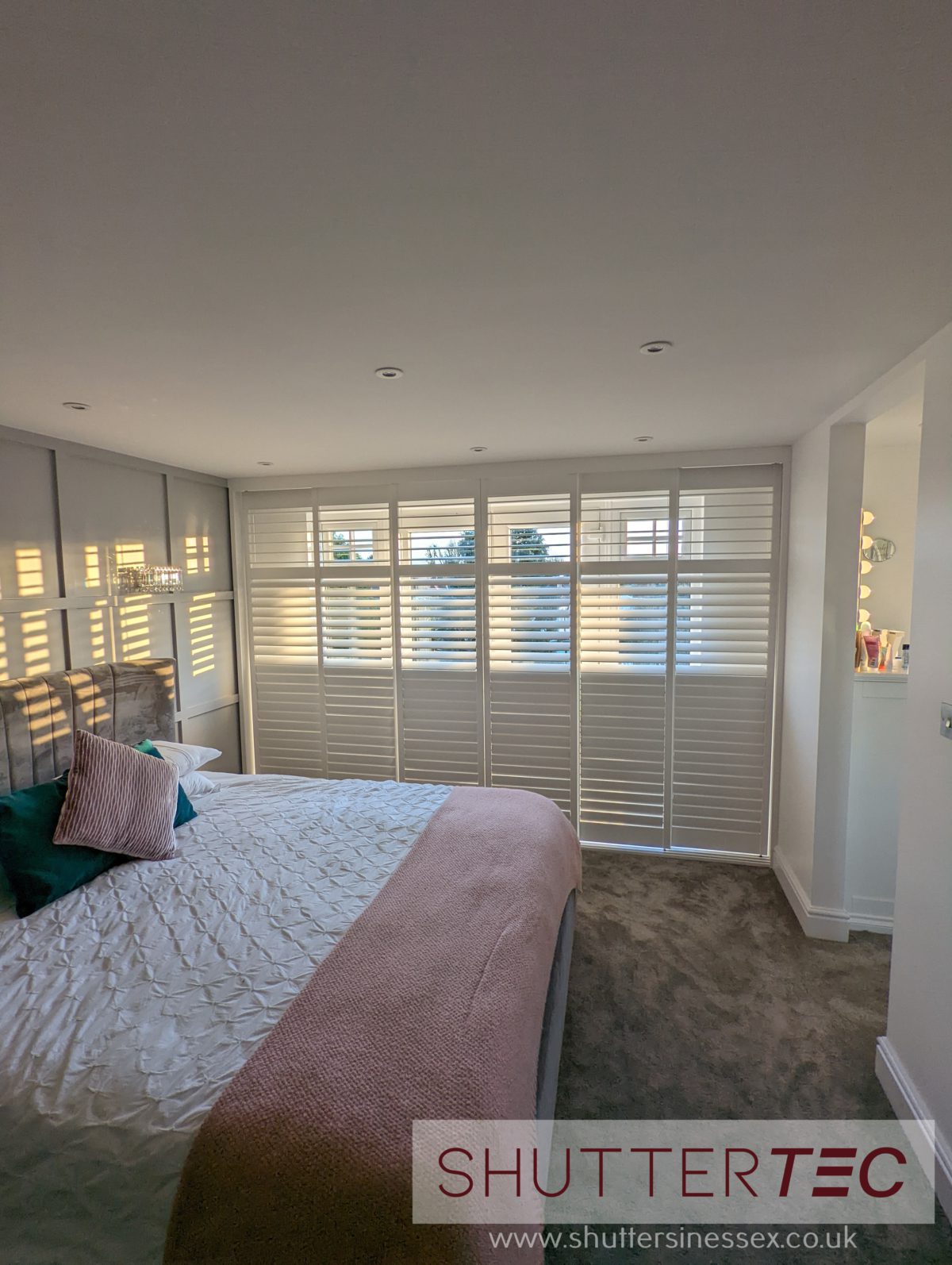 Tracked Shutters - The Solution for Wide Doors | Shuttertec